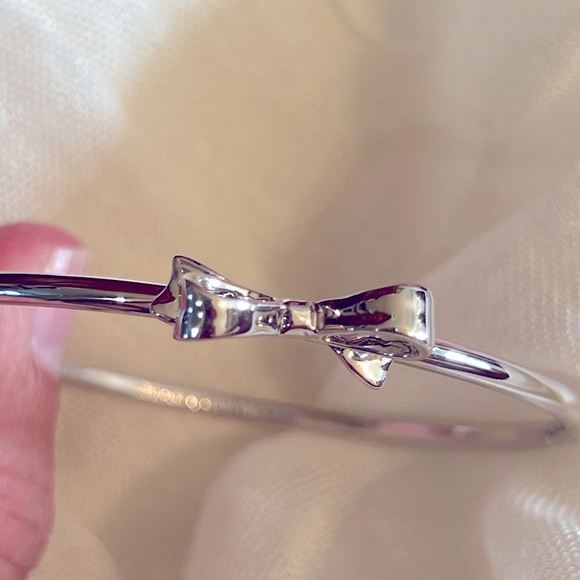kate spade | Jewelry | Gently Worn Kate Spade Hinged Silver Bow Bangle ...